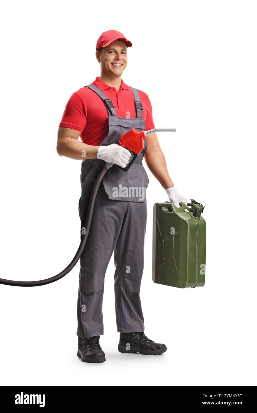 Gas station worker holding a jerrycan and a fuel gun isolated on white ...