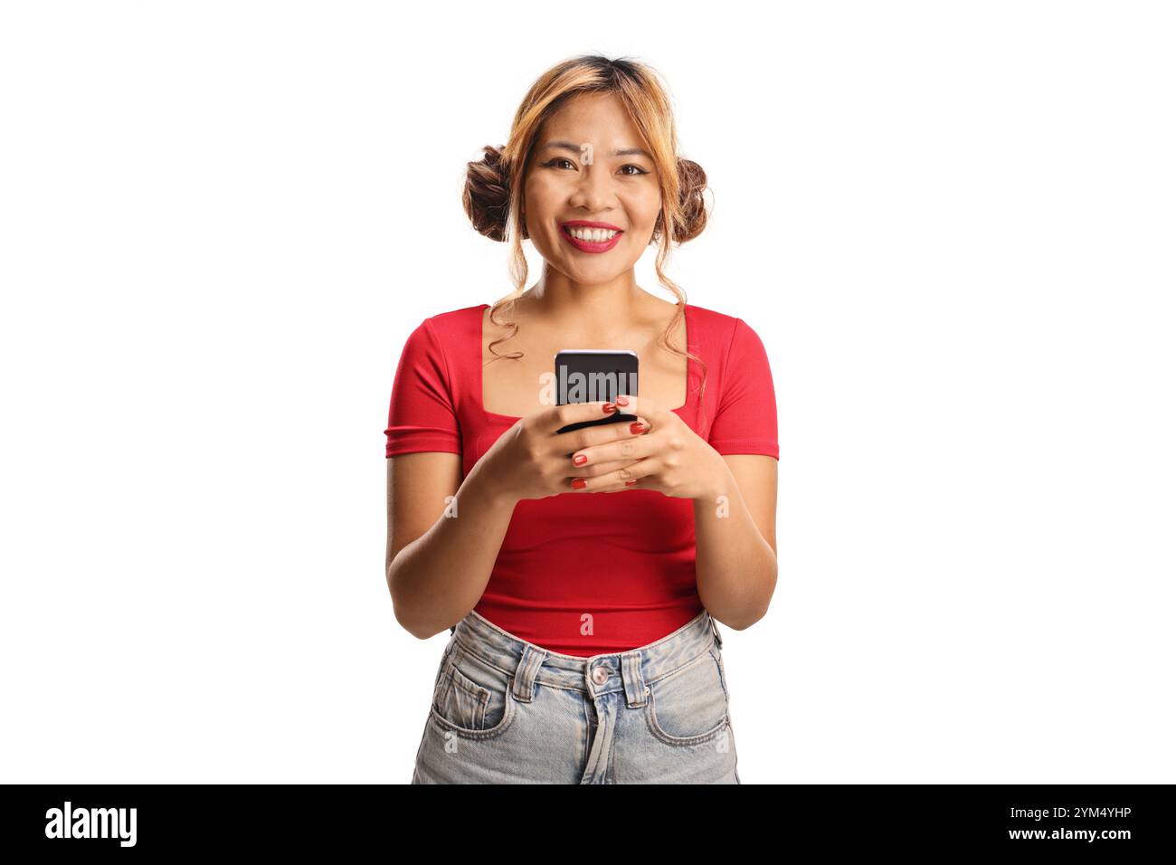 Young filipina woman using a smartphone and smiling isolated on white ...