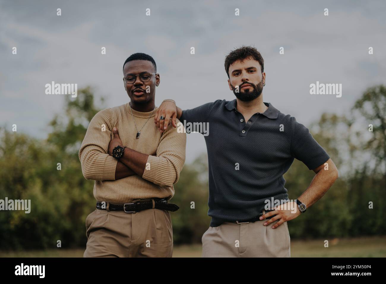 Two friends enjoying a relaxed day in nature together Stock Photo - Alamy