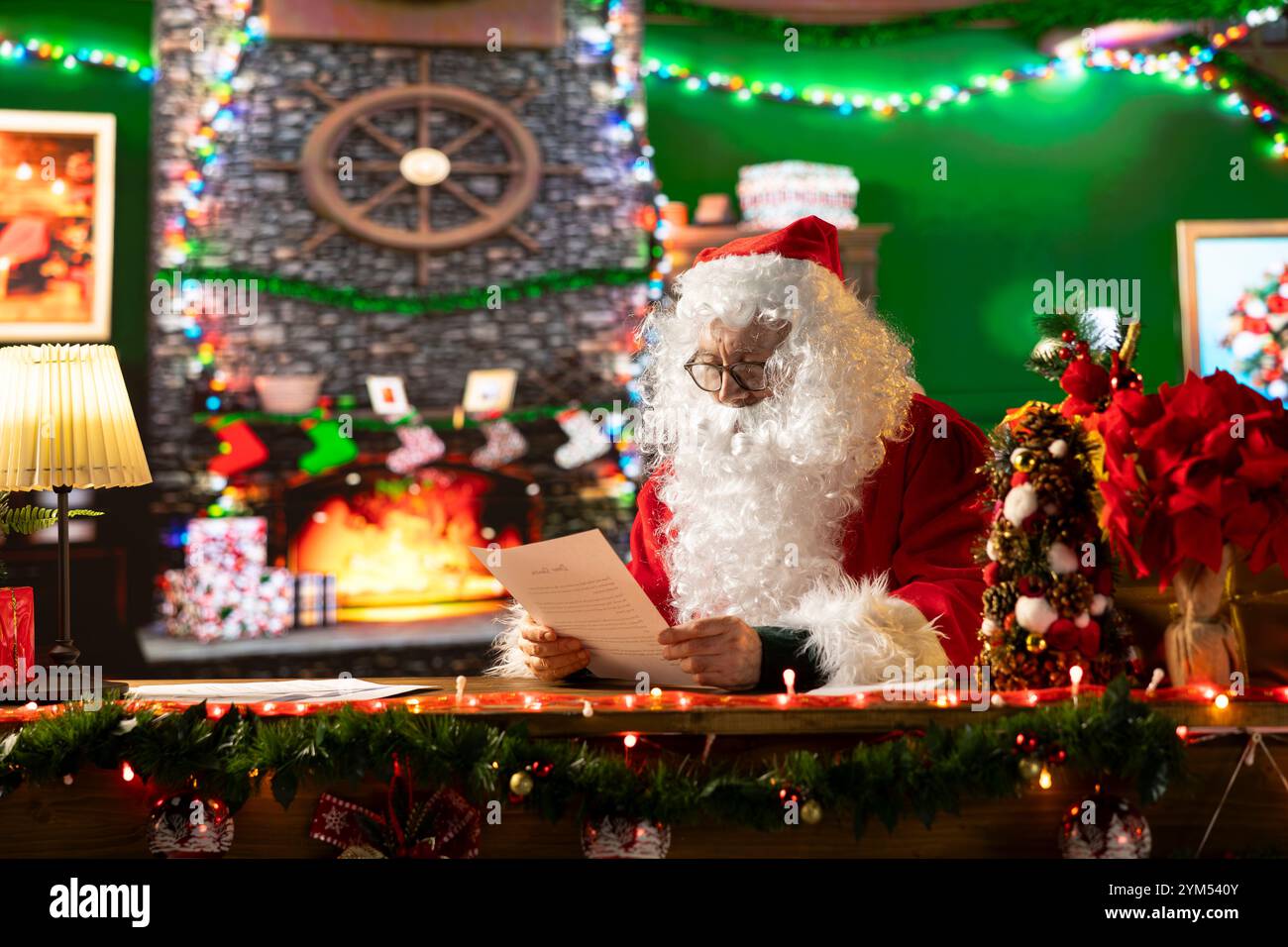 Santa Claus checks his list twice in this warm Christmas setting ...