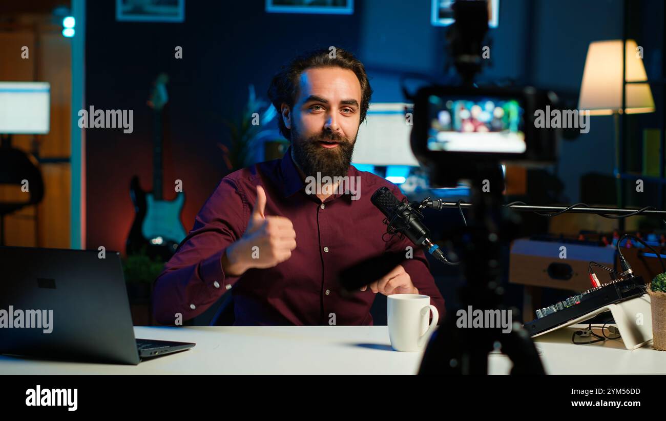 Upbeat content creator hosting online show in rgb lights studio ...