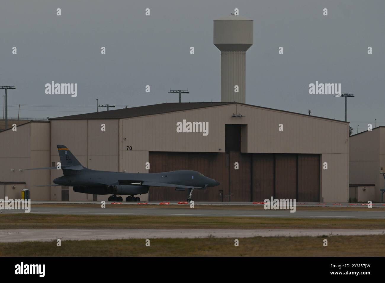 A U.S. Air Force B-1B Lancer assigned to the 37th Bomb Squadron taxis ...