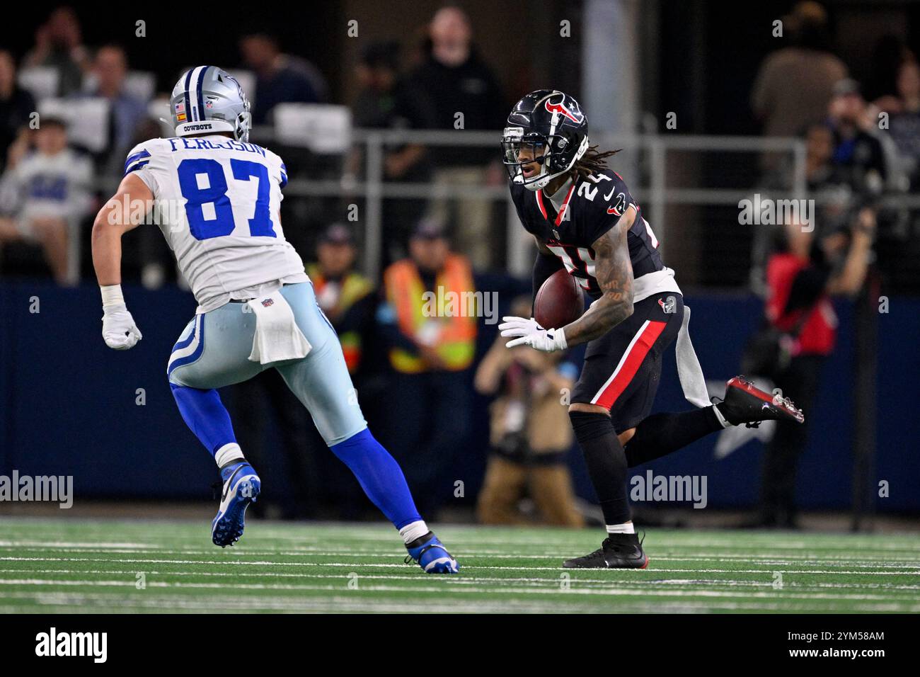 Dallas Cowboys tight end Jake Ferguson (87) chases Houston Texans cornerback Derek Stingley Jr ...