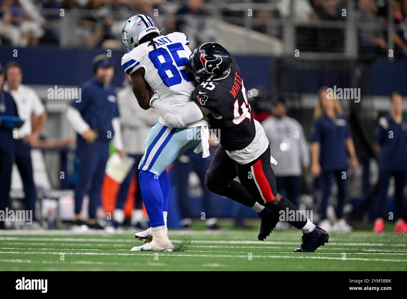 Houston Texans linebacker Devin White (45) tackles Dallas Cowboys tight ...