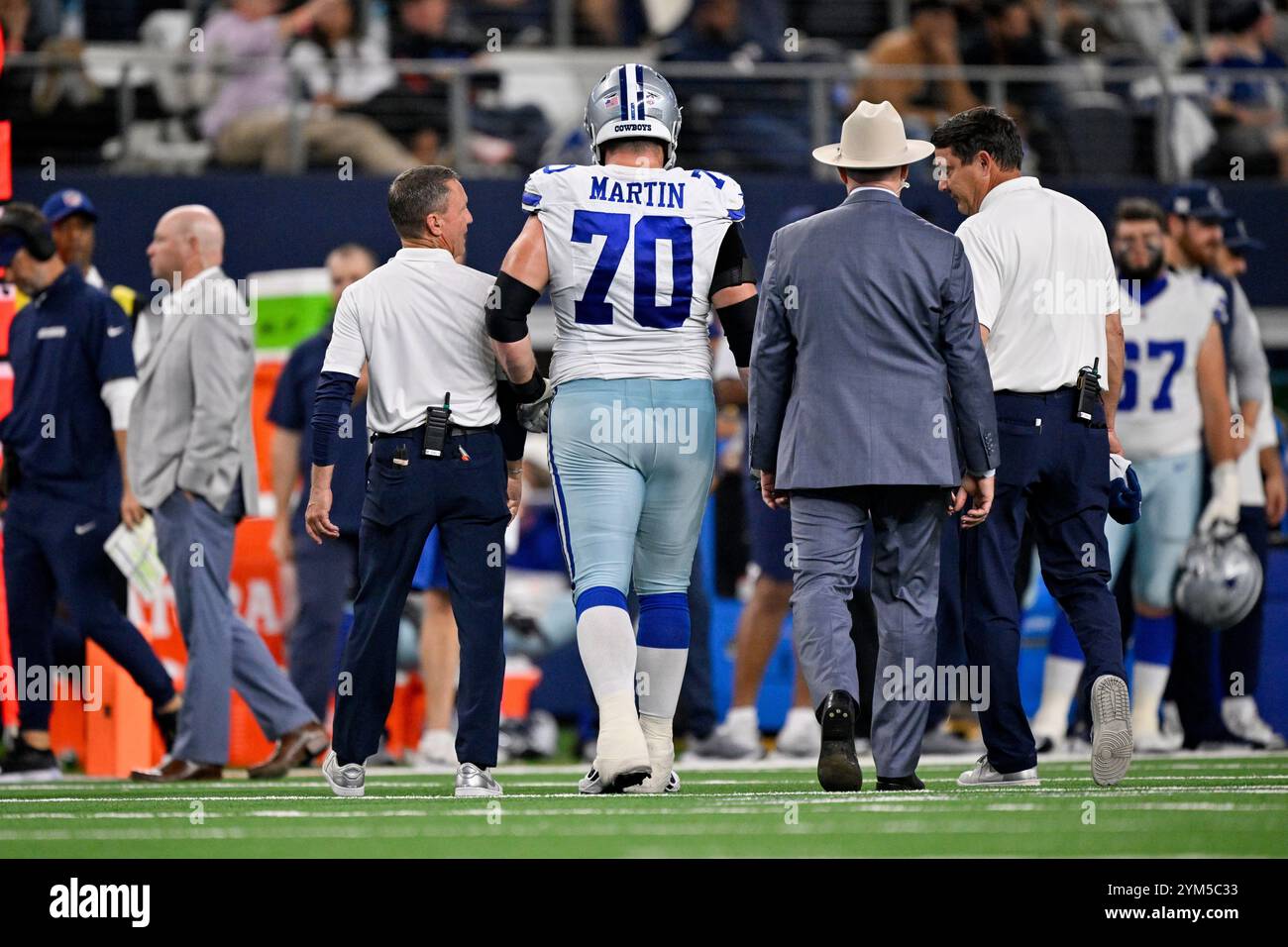 Dallas Cowboys guard Zack Martin (70) leaves the game with an injury ...