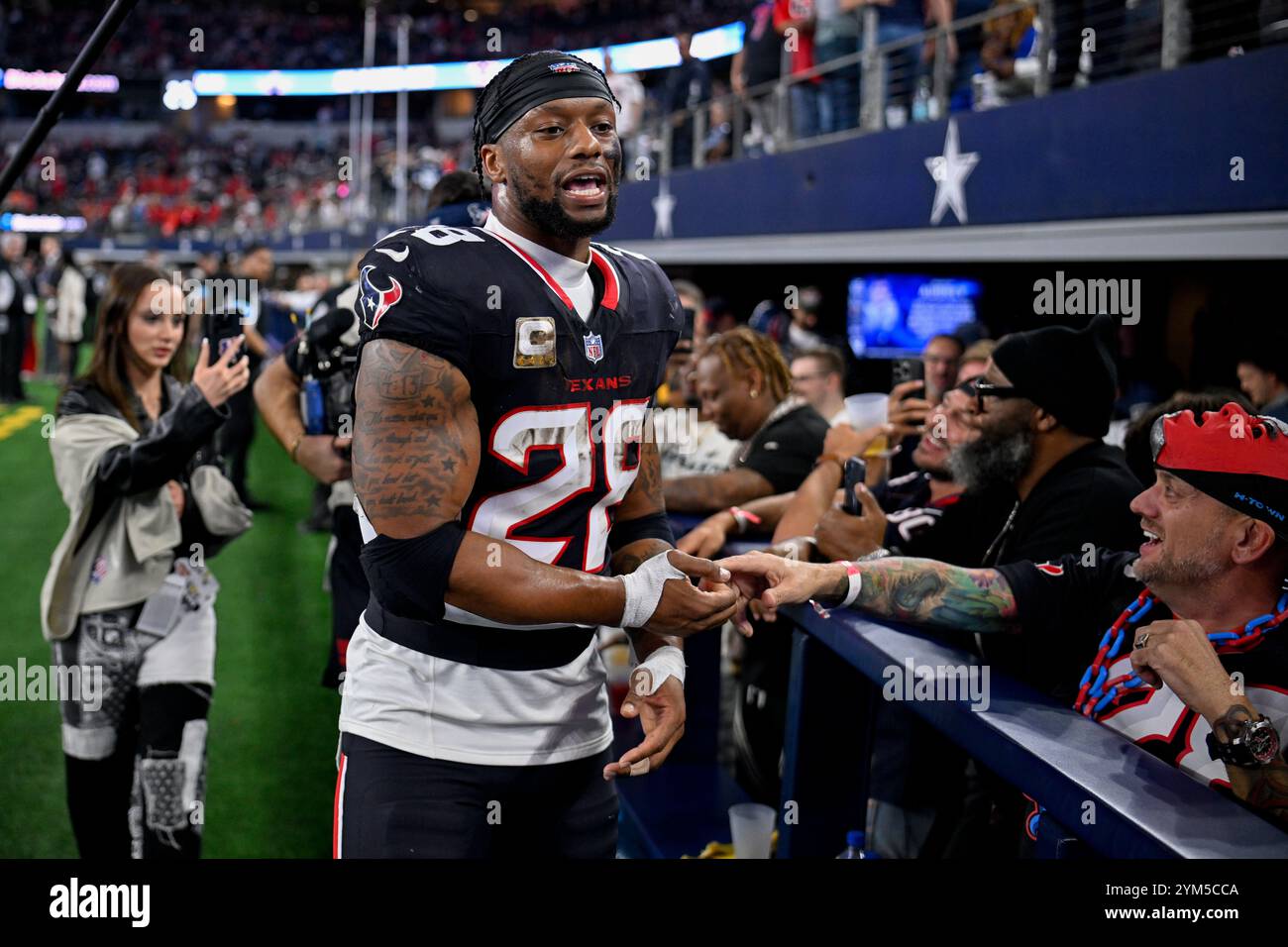 Houston Texans running back Joe Mixon (28) celebrates with the fans ...