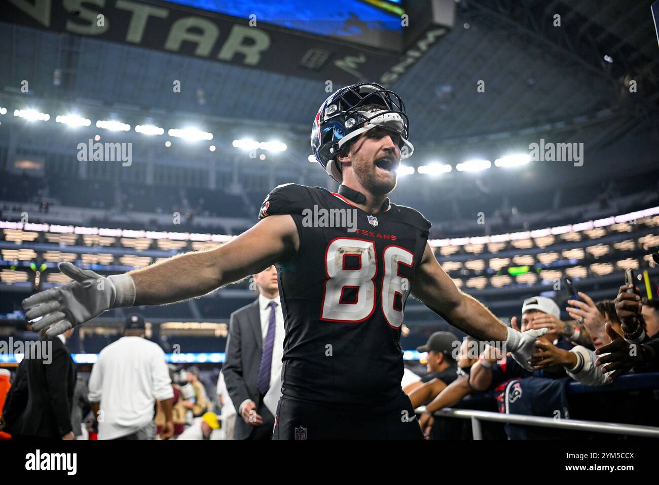 Houston Texans tight end Dalton Schultz (86) celebrates with the fans ...