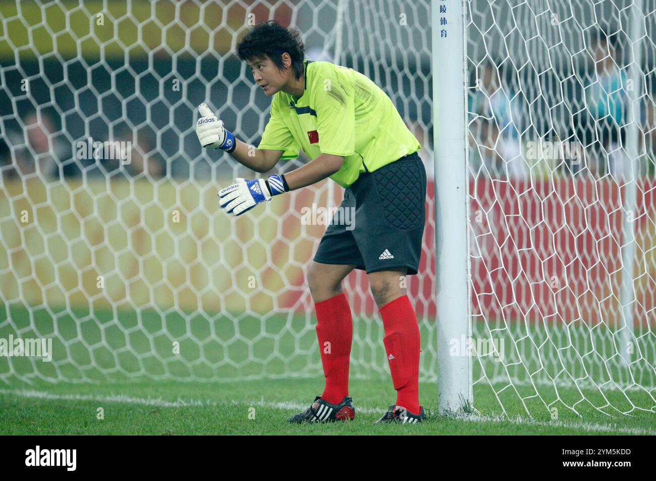 TIANJIN, CHINA - AUGUST 6: Goalkeeper Zhang Yanru of China directs her defense during a Group E ...