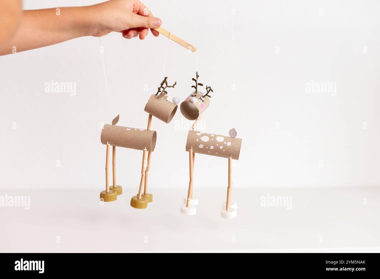 controlling DIY reindeer puppets made from cardboard tubes and bottle ...