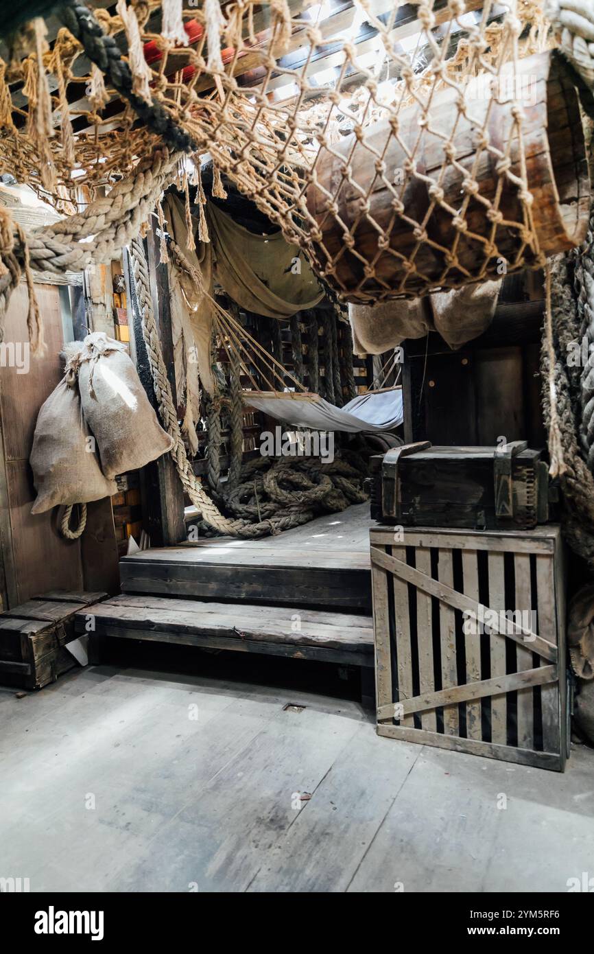 the hold of an old ship with rigging and ropes Stock Photo - Alamy