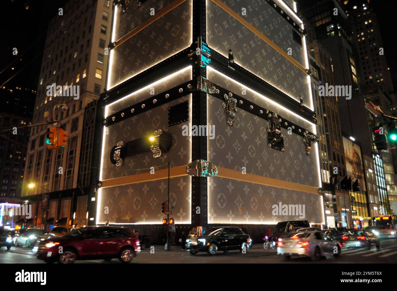 The Louis Vuitton flagship store is covered by temporary luggage ...