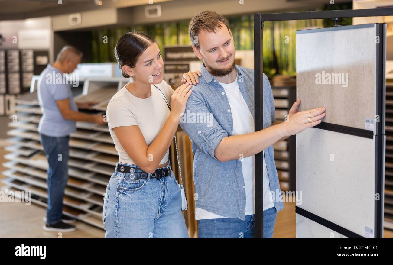 Young couple choosing ceramic tiles hi-res stock photography and images ...
