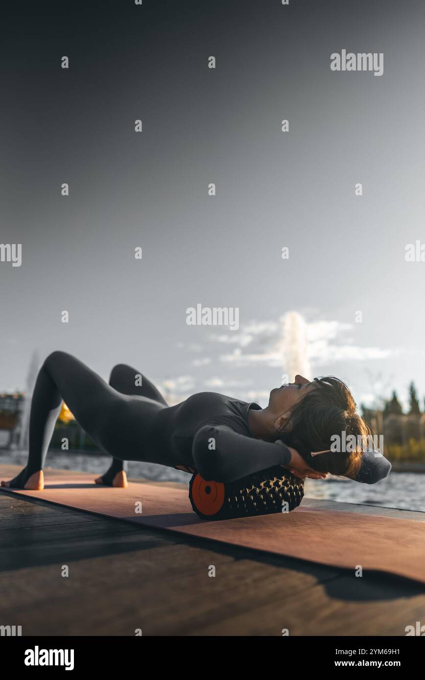 active fitness woman practicing muscular relaxation exercise with ...