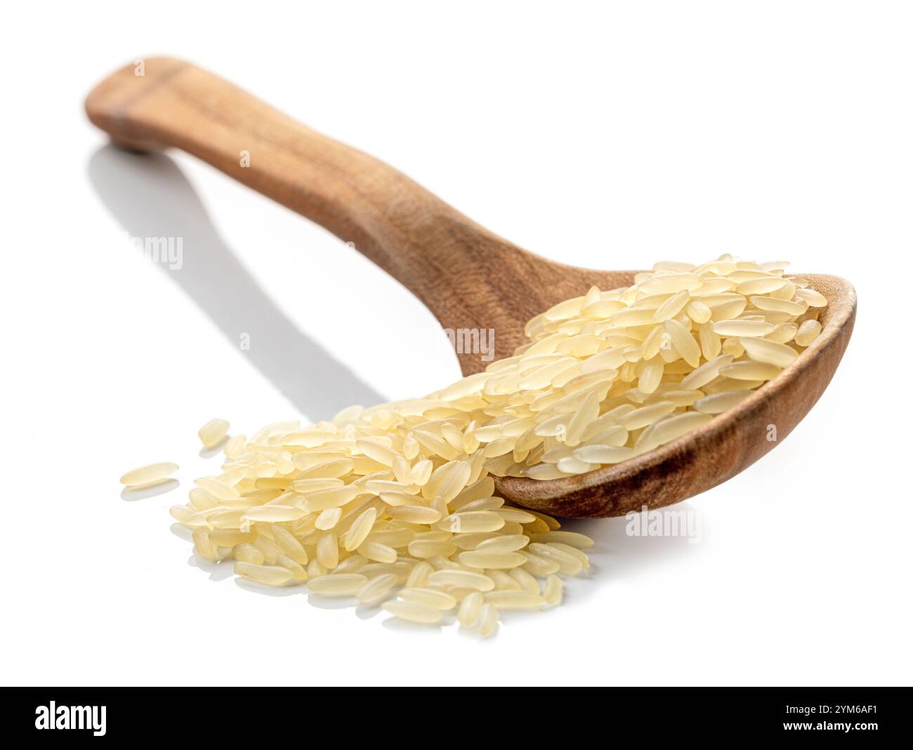 spoon of raw rice isolated on white background Stock Photo - Alamy