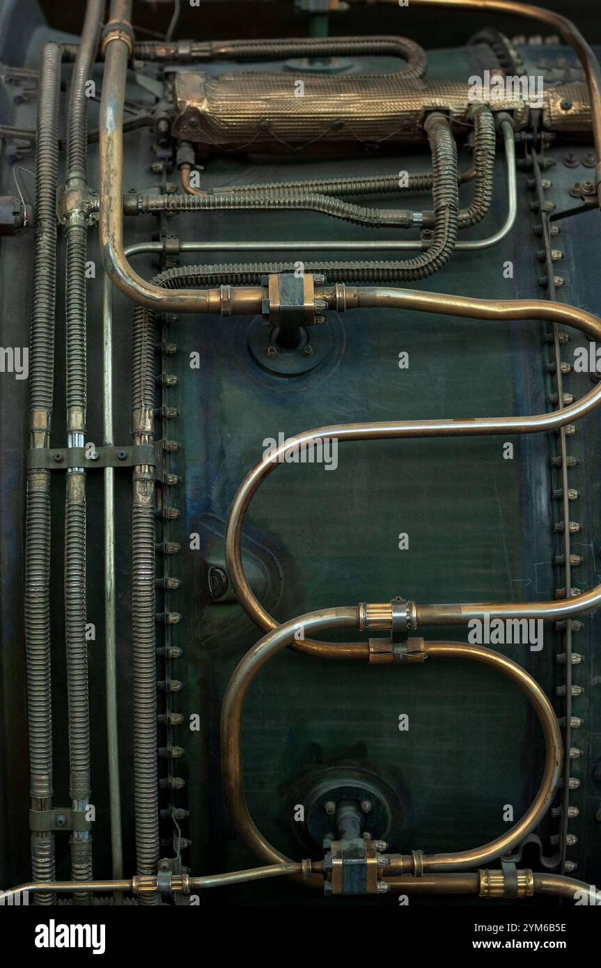 Industrial techno background of various pipes and wires on the aircraft ...