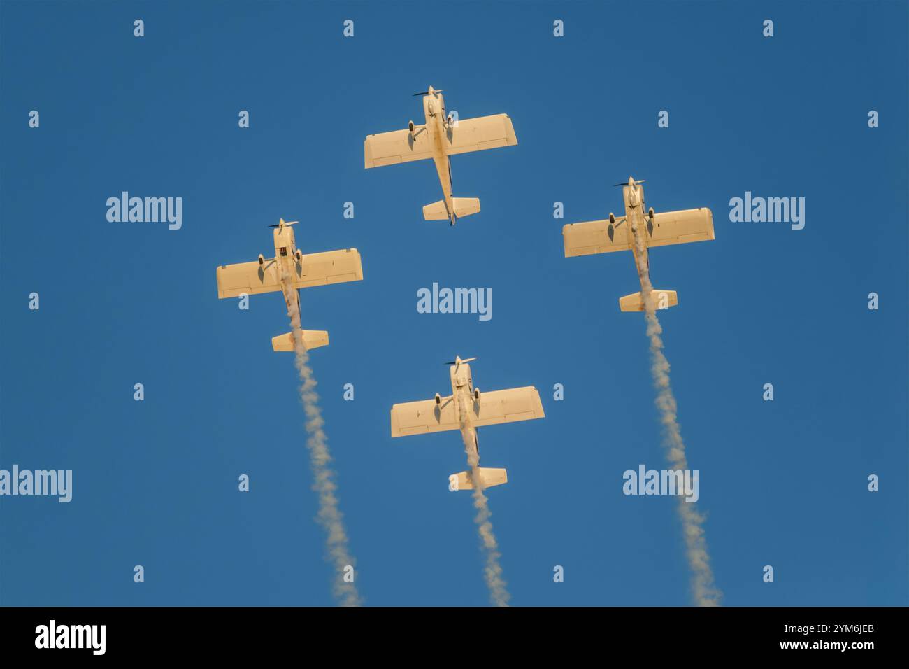 Stunt aerobatic planes performing stunts in air Stock Photo - Alamy