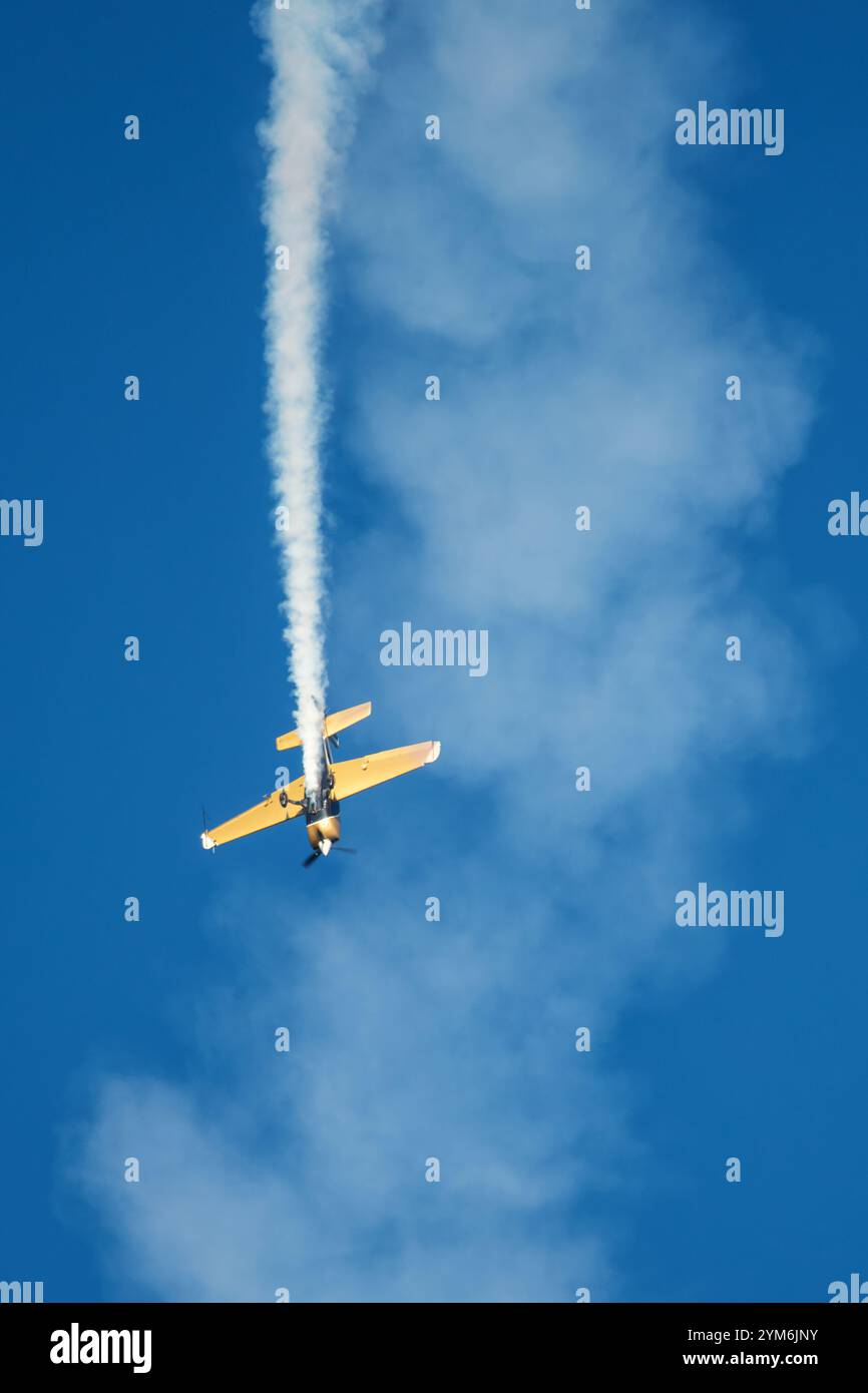 Stunt aerobatic plane performing stunts in air Stock Photo - Alamy
