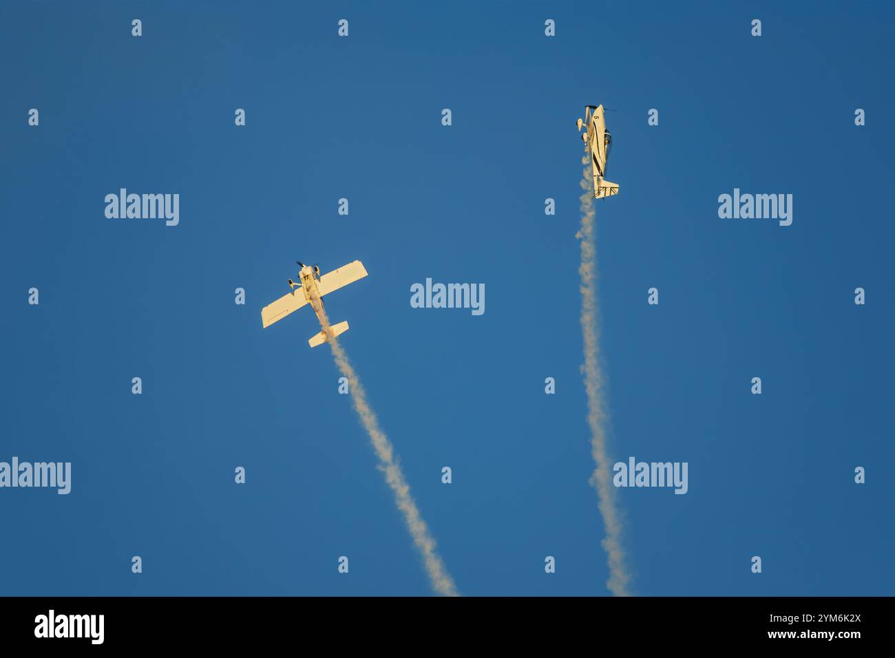 Stunt aerobatic plane performing stunts in air Stock Photo - Alamy