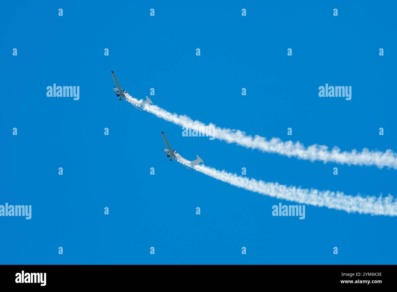 Stunt aerobatic plane performing stunts in air Stock Photo - Alamy