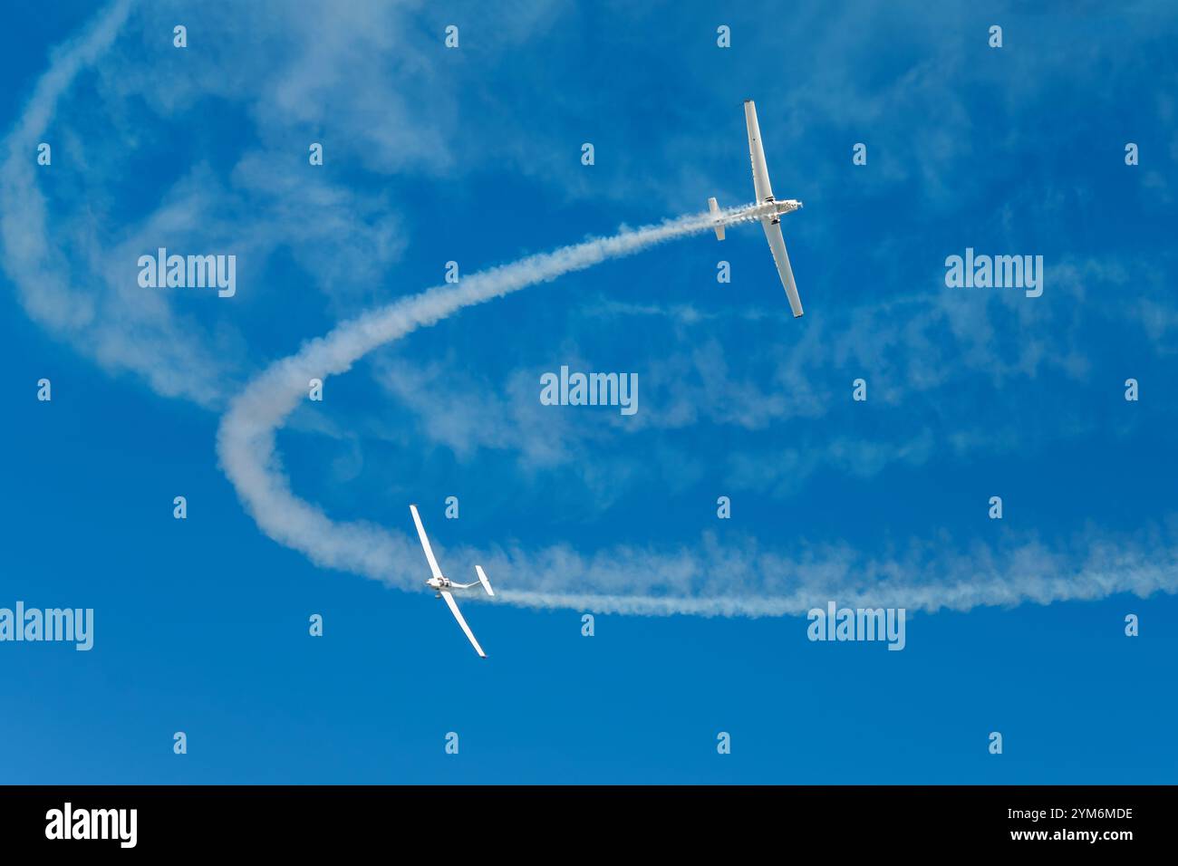 Stunt aerobatic plane performing stunts in air Stock Photo - Alamy