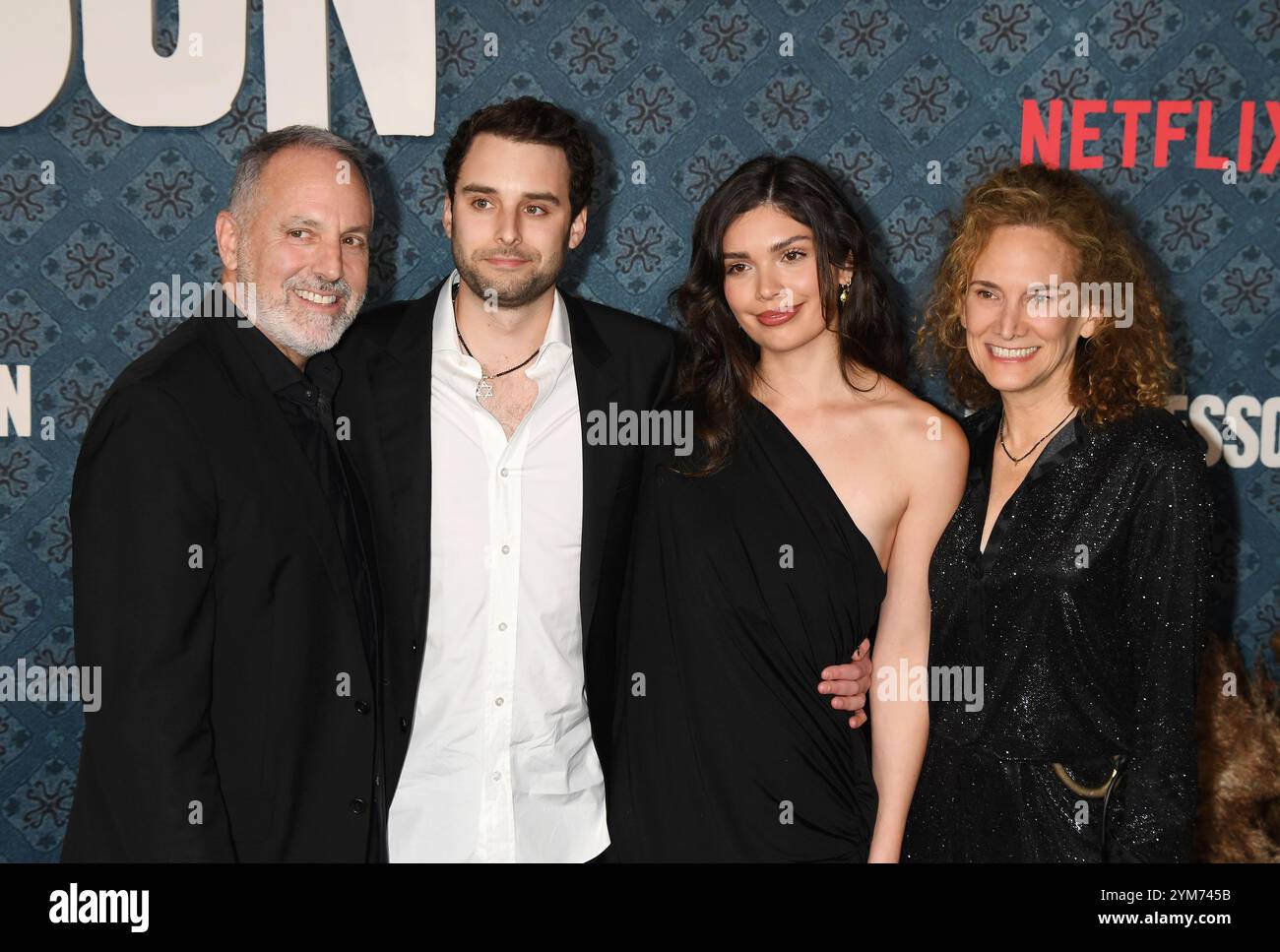 LOS ANGELES, CALIFORNIA - NOVEMBER 19: Todd Black (L) and family attend the premiere of Netflix ...