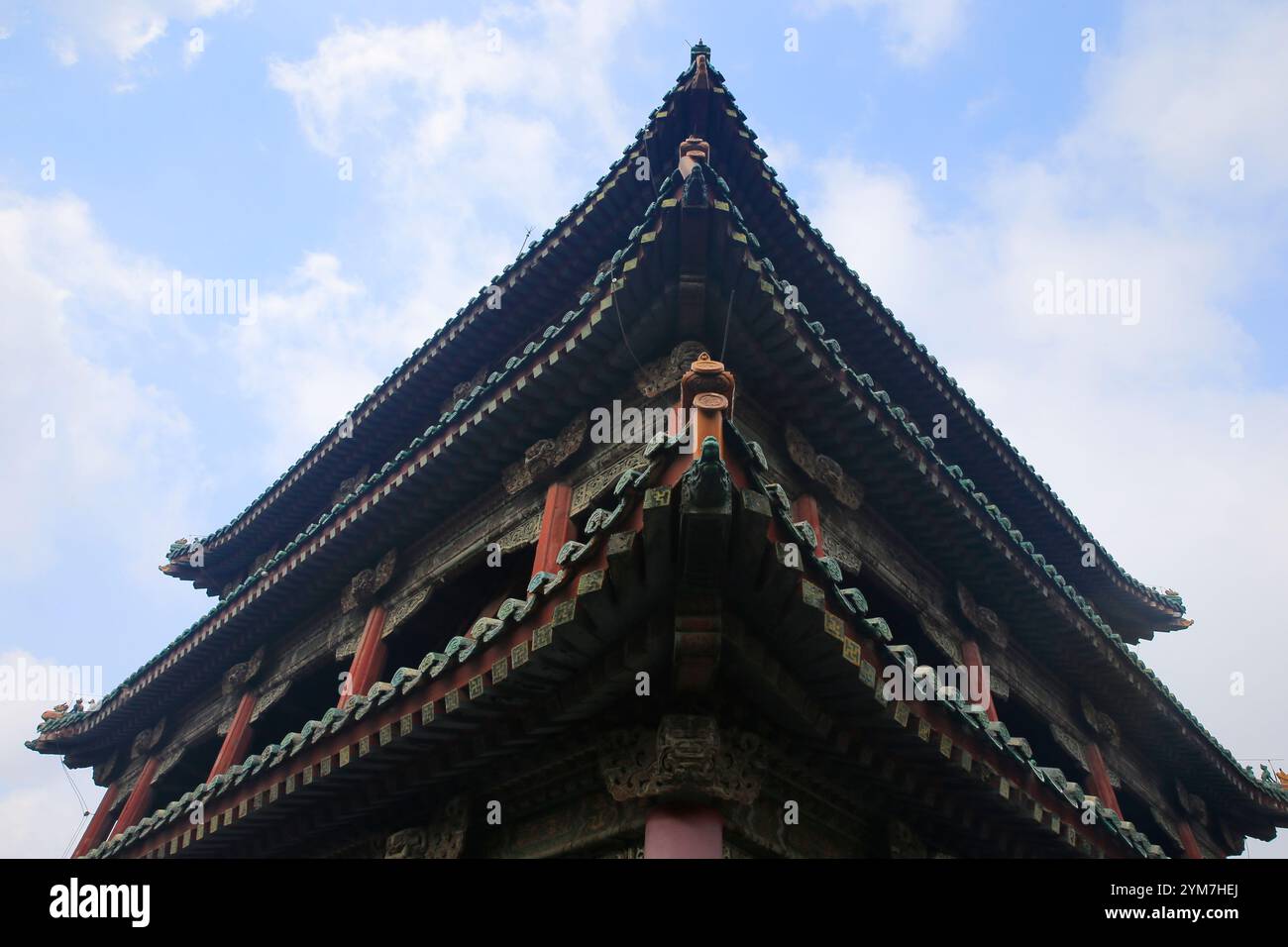 The blue glazed tiles on the wall as the background, the traditional ...