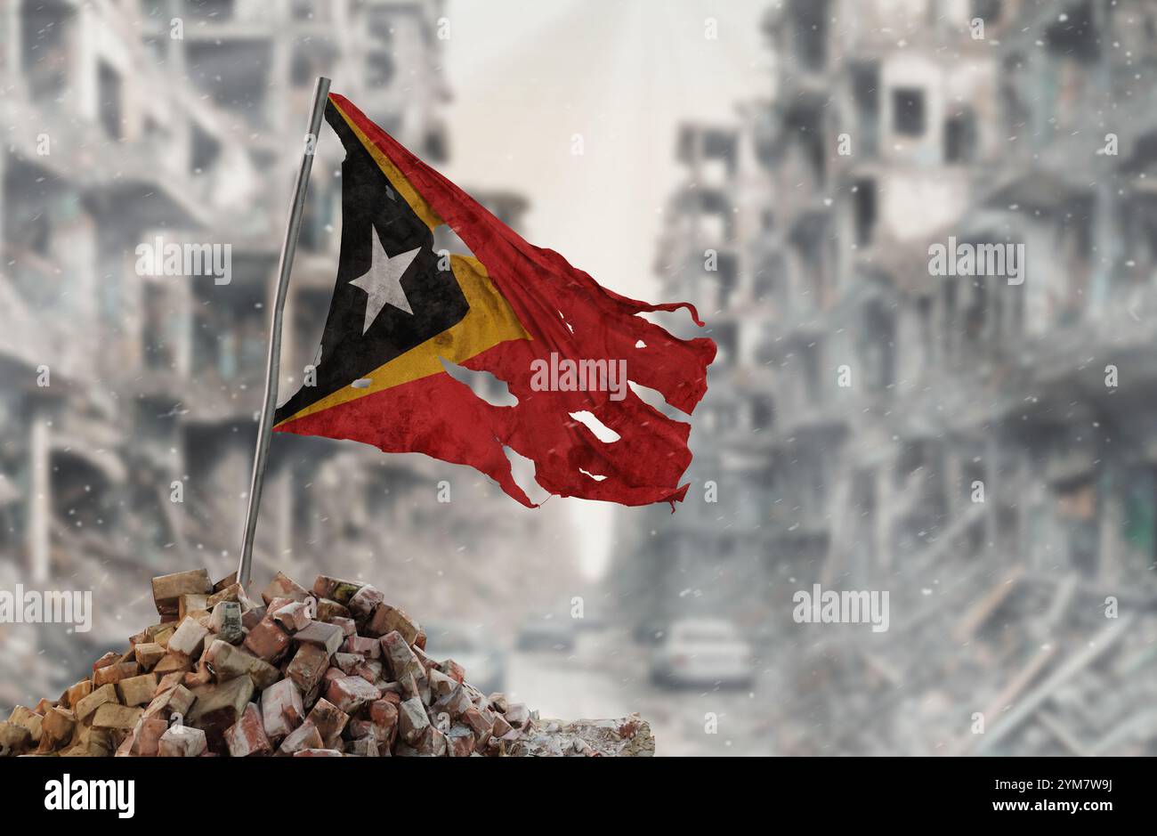 Dirty and torn East Timor flag, symbol of resistance and victory. A ...