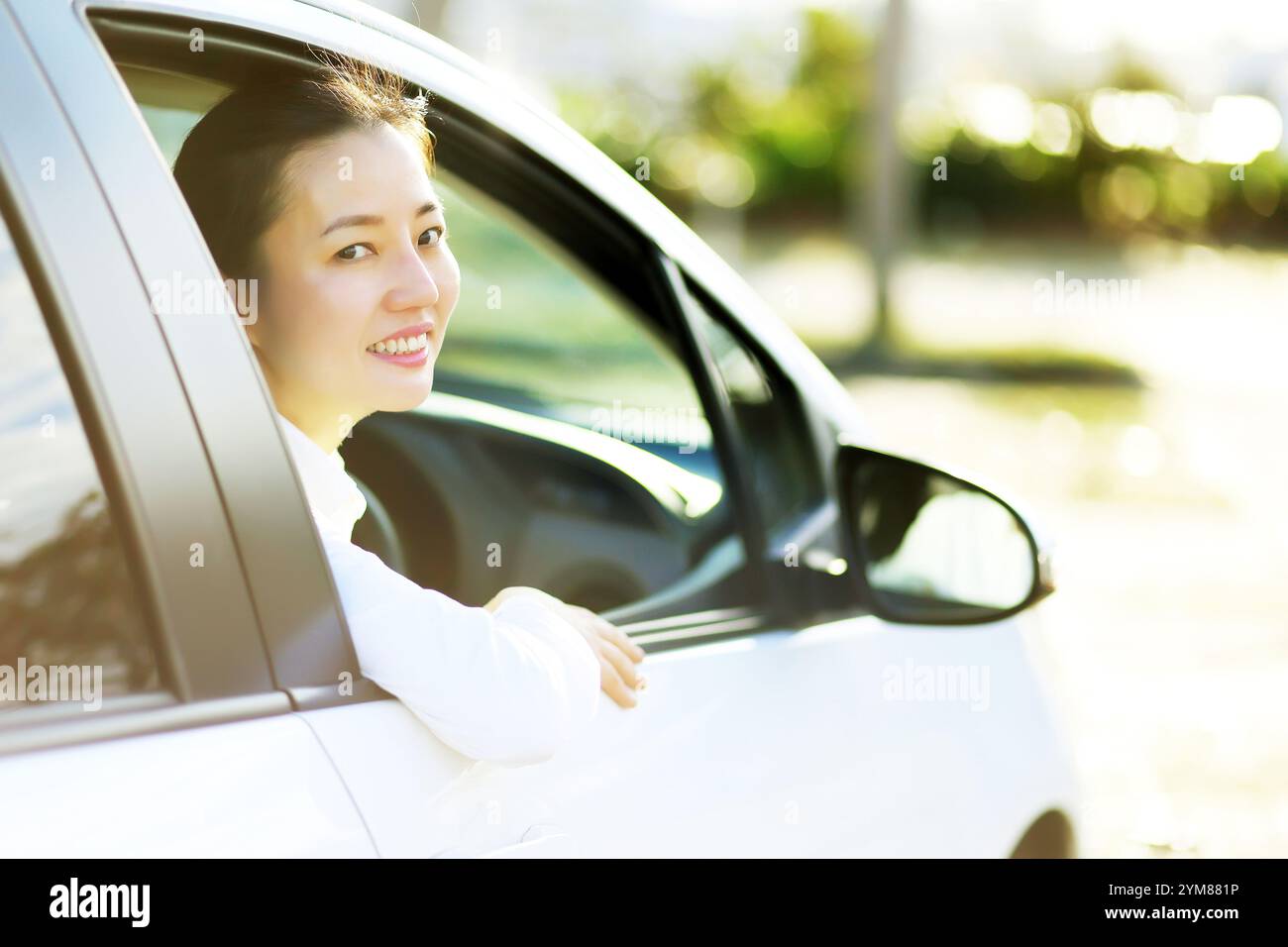 Woman enjoying a drive Stock Photo - Alamy