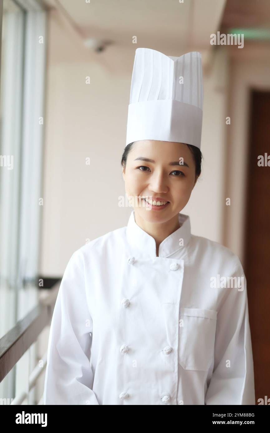 Chef . Young woman at work Stock Photo - Alamy