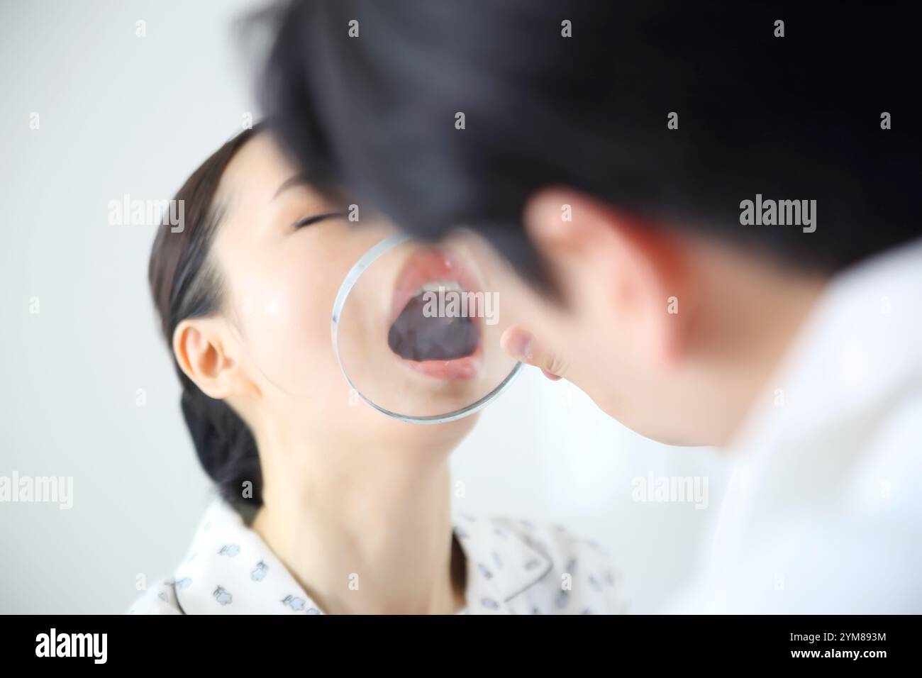 Doctor giving medical treatment at a hospital Stock Photo - Alamy