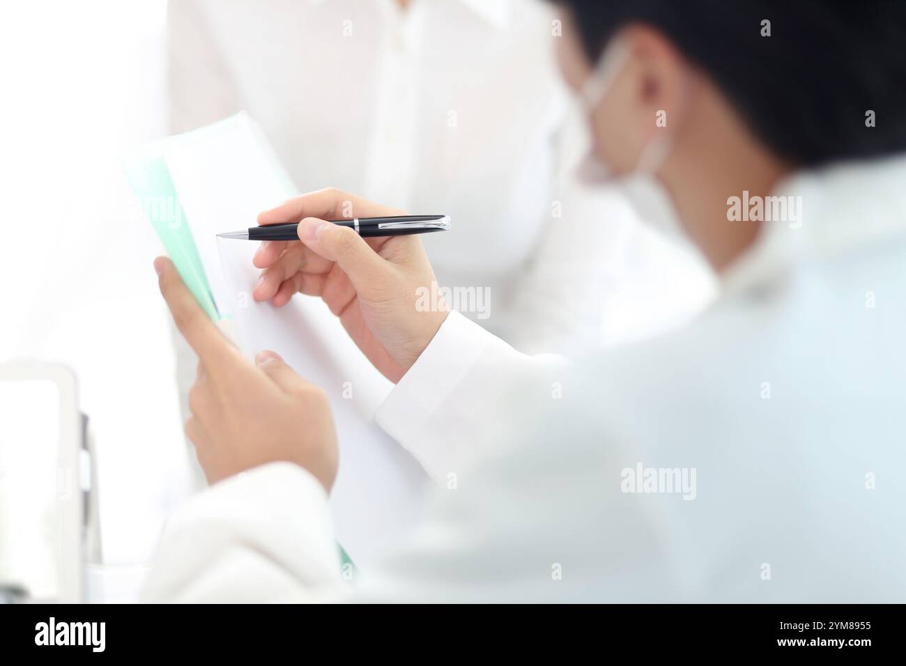 Doctor checking patient's condition Stock Photo - Alamy