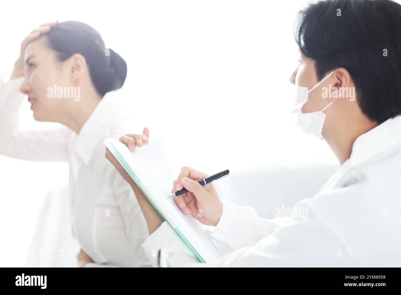 Doctor checking patient's condition Stock Photo - Alamy