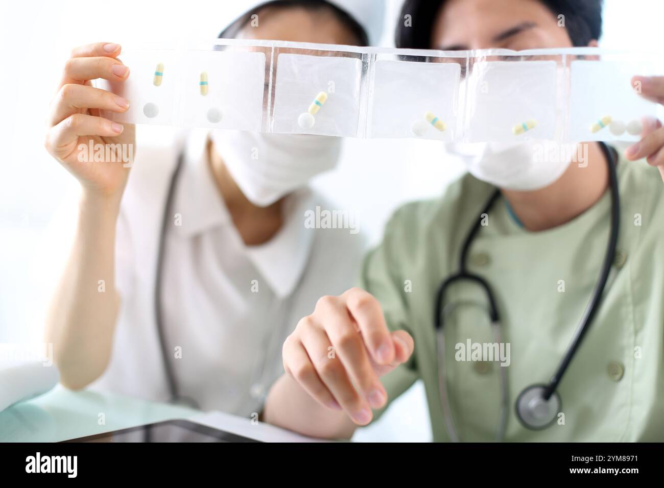 Image of a pharmaceutical researcher consulting with a pharmaceutical ...