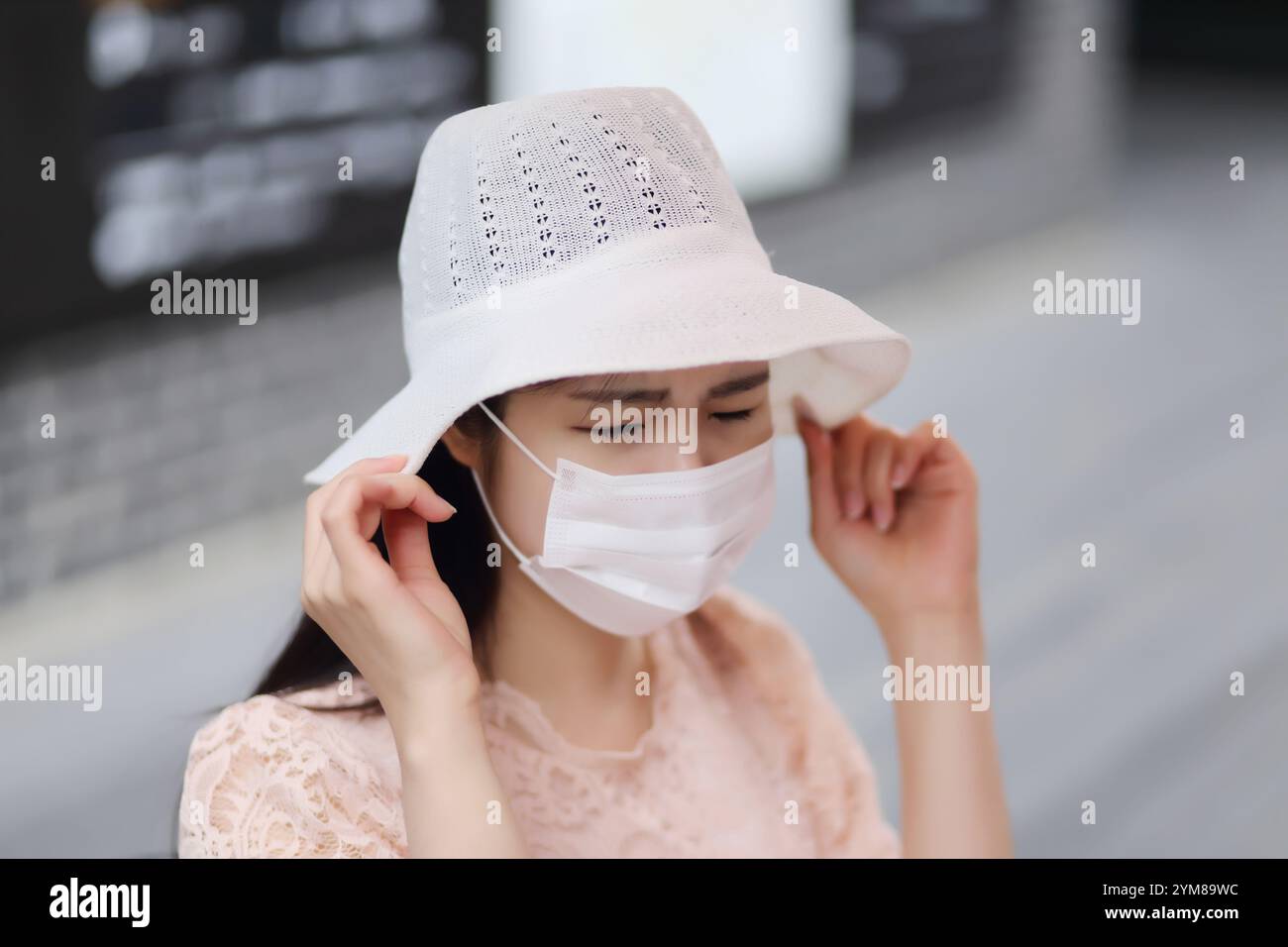 Mask on the street hi-res stock photography and images - Alamy