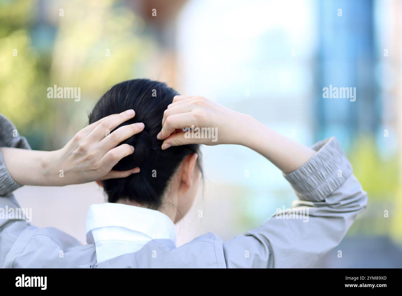 Woman having her hair done Stock Photo - Alamy