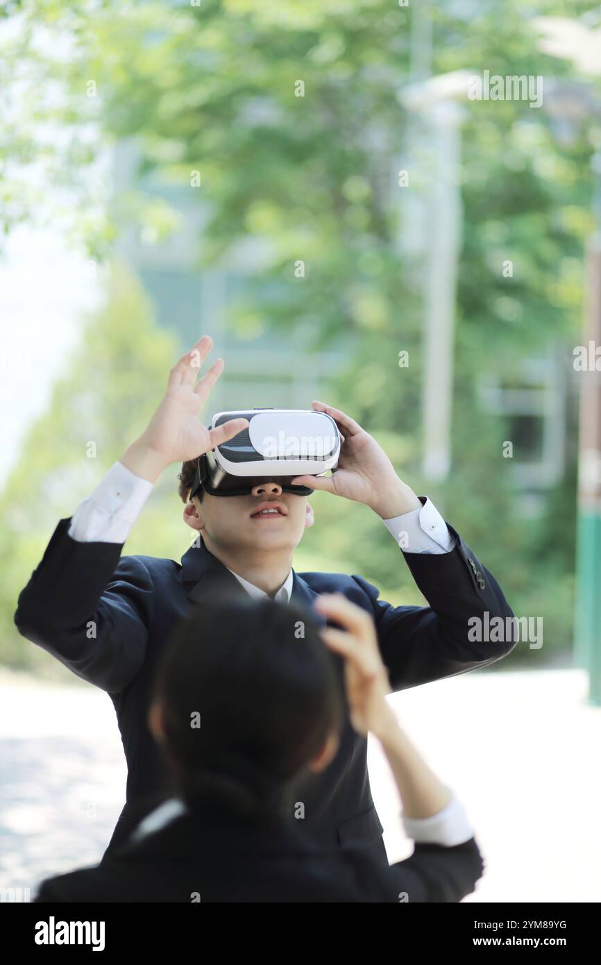 Japanese businessman using virtual hi-res stock photography and images ...