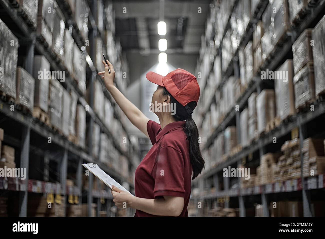Woman checking product hi-res stock photography and images - Alamy