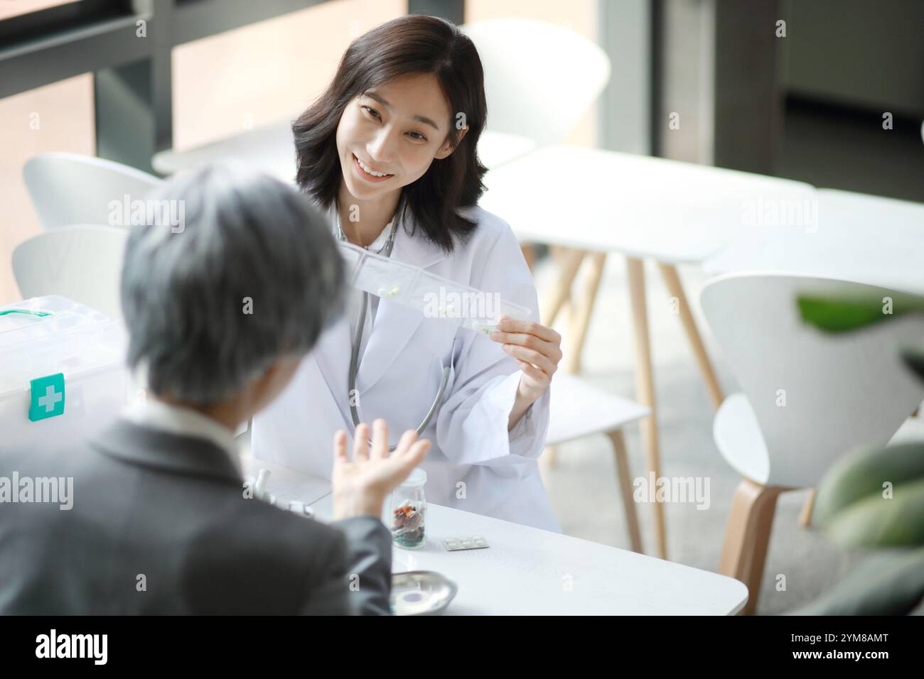 Pharmaceutical company employee and doctor Stock Photo - Alamy