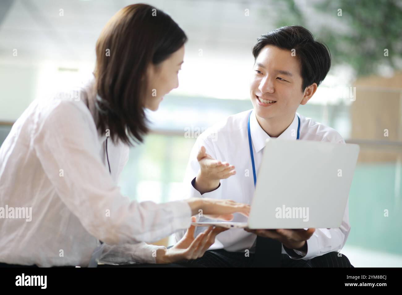 Salesman doing business with a smile Stock Photo - Alamy