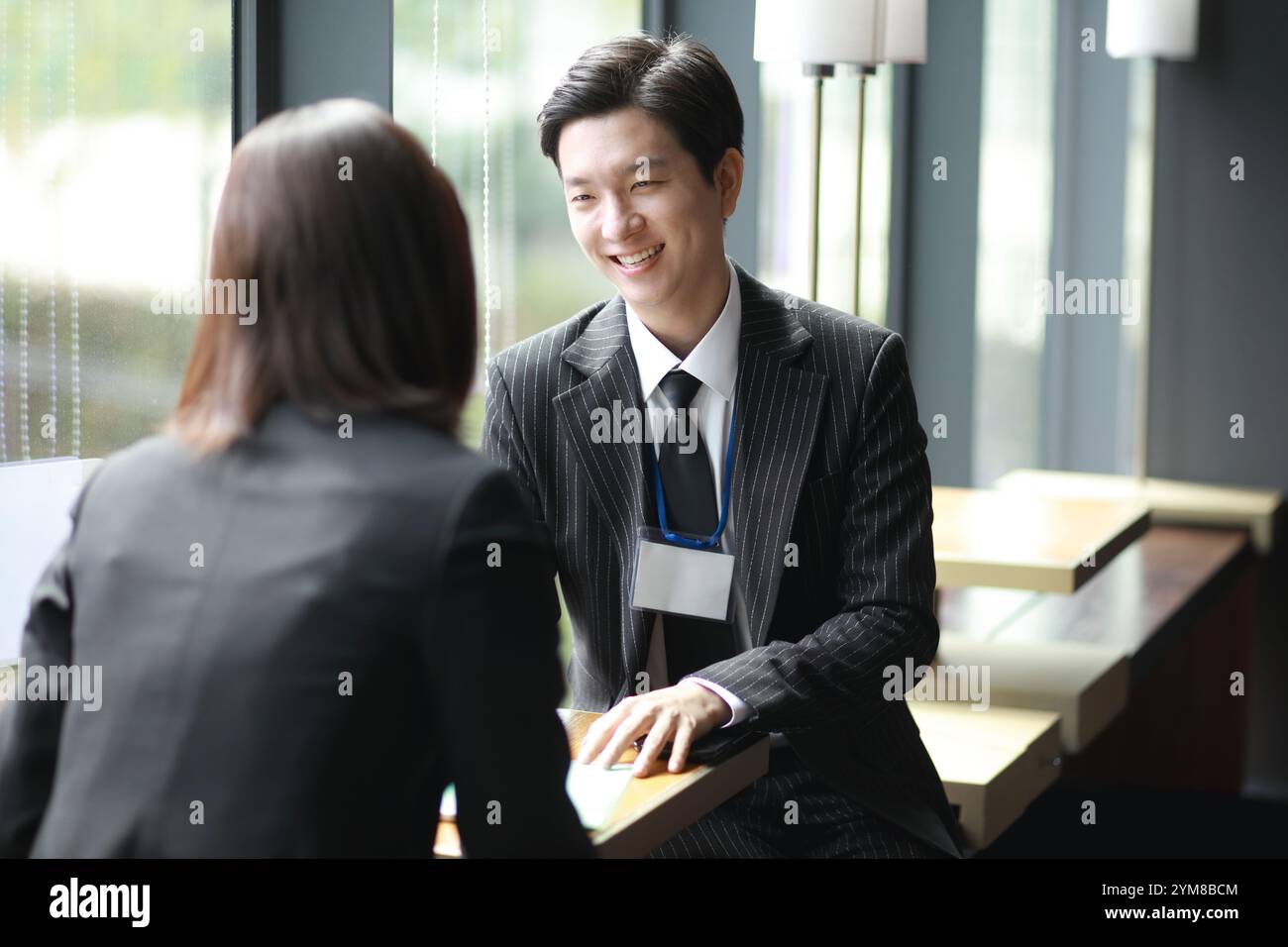 Business man conducting business sales activity Stock Photo - Alamy