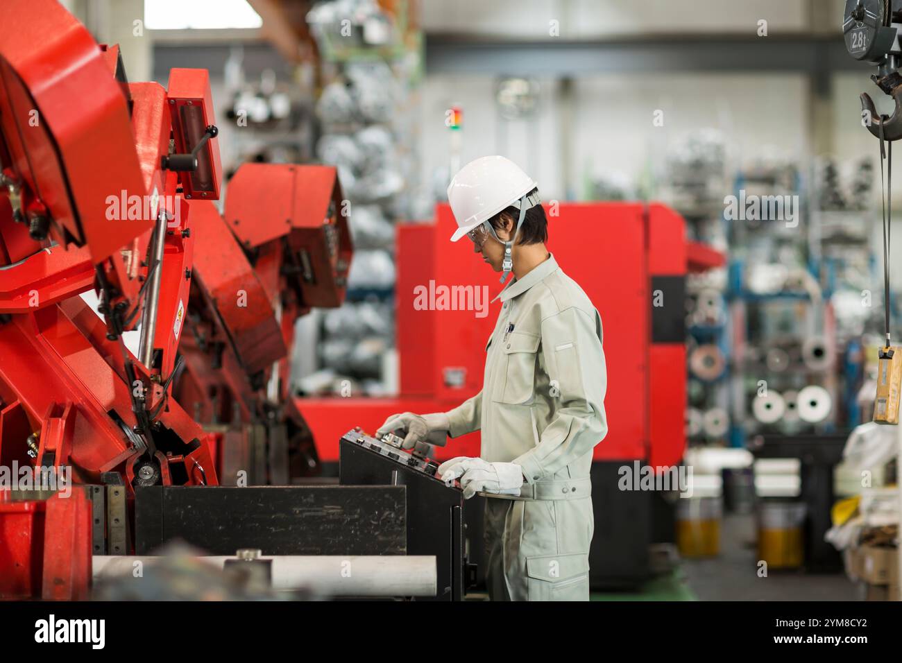 Work operating machinery hi-res stock photography and images - Alamy