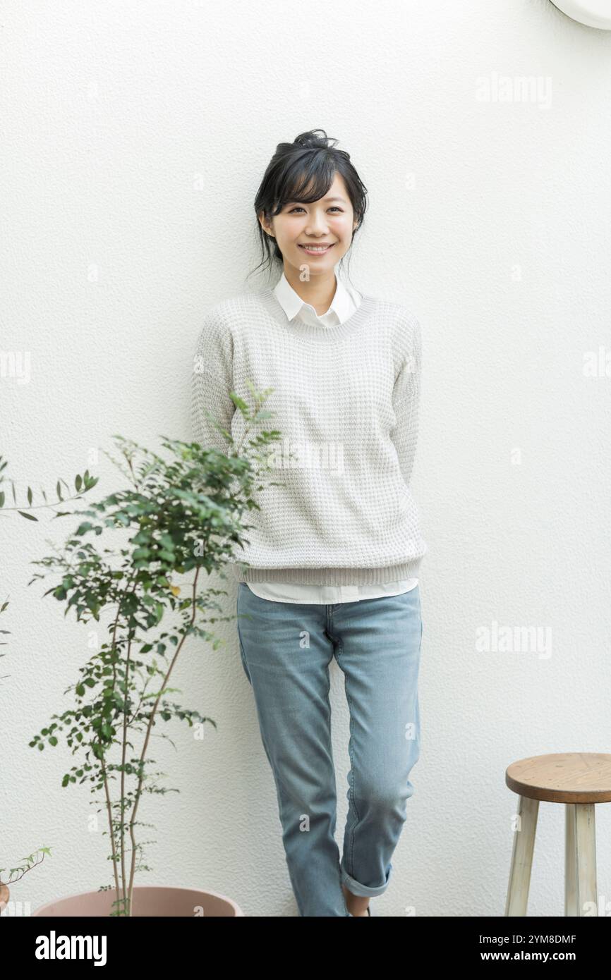 Woman outdoors on terrace hi-res stock photography and images - Alamy