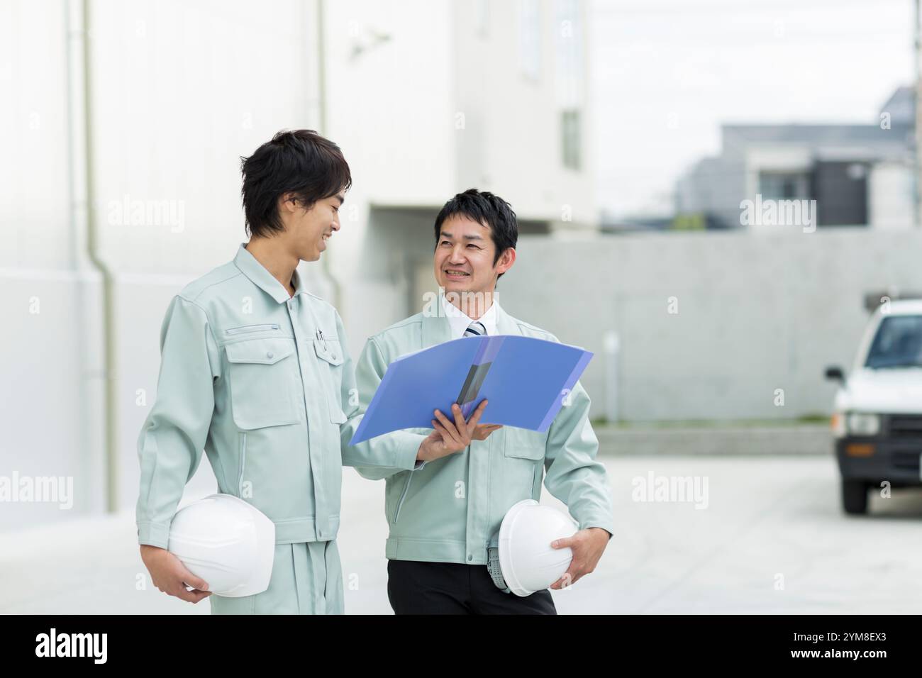 Two men in work hi-res stock photography and images - Alamy