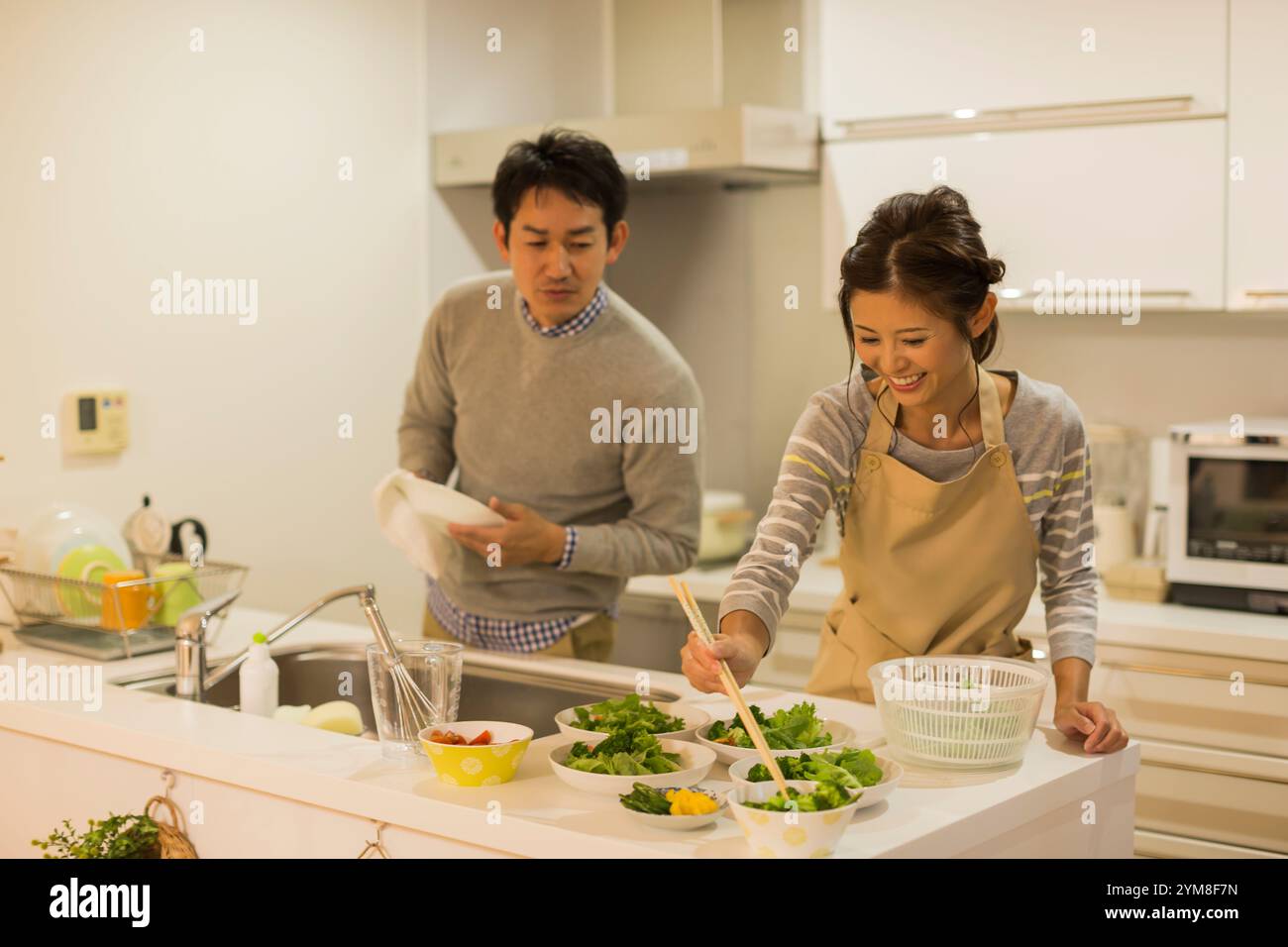 Couple eating drinking in kitchen hi-res stock photography and images ...