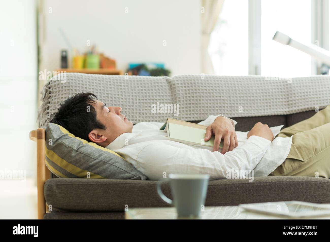 Man taking a nap hi-res stock photography and images - Alamy