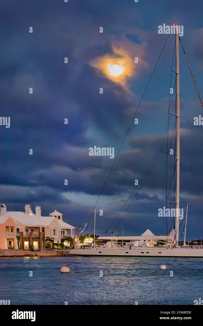 Beaver Moon Illuminating the Clouds Over Hamilton Harbor Bermuda at Nautical Twilight Stock ...