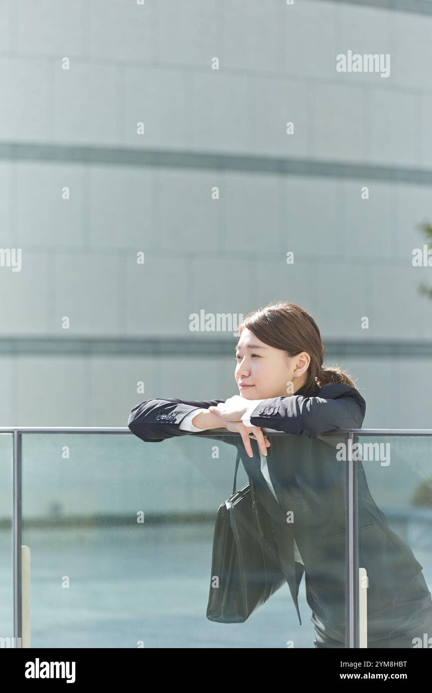 Working women taking a break outside Stock Photo - Alamy