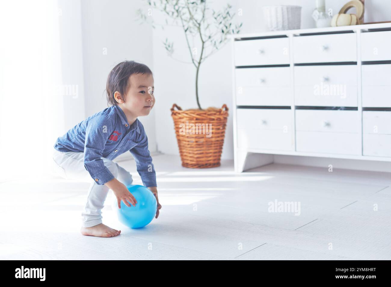 Boy playing ball in hi-res stock photography and images - Alamy