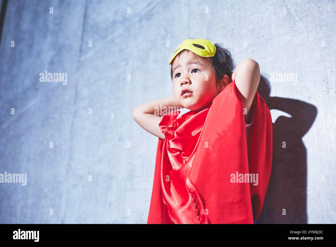 Little Superman taking a break Stock Photo - Alamy