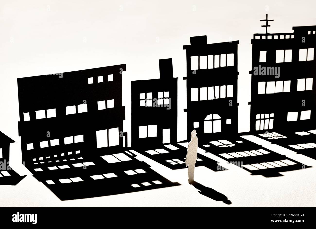 Shadow puppet people and town Stock Photo - Alamy